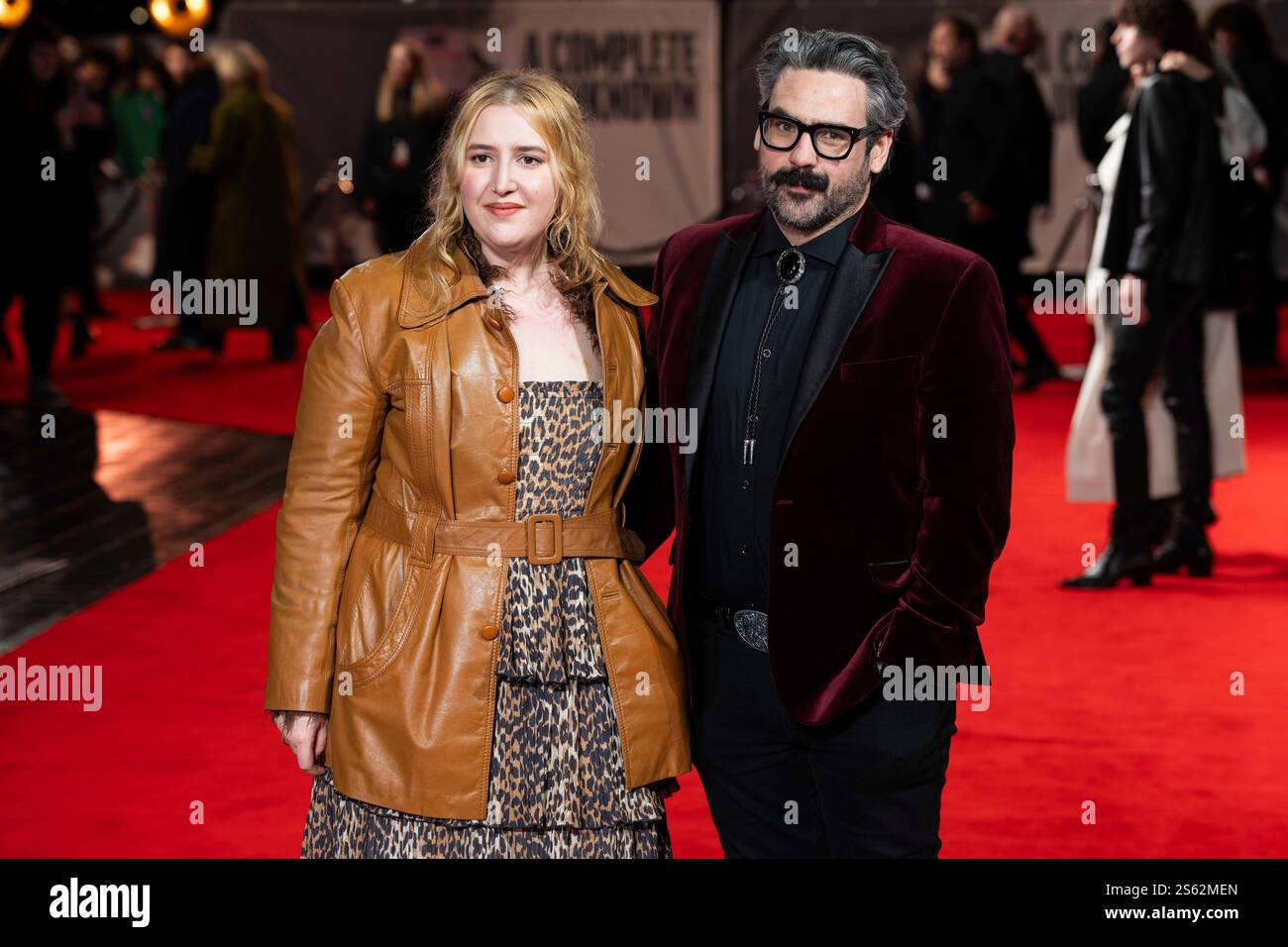 Honey Ross, left, and Gav Murphy pose for photographers upon arrival at ...