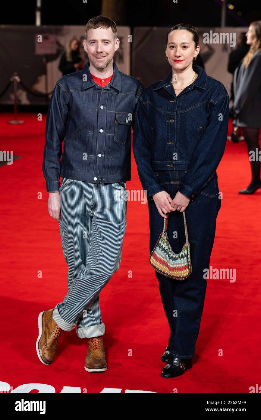 Ricky Wilson, left, and Grace Zito pose for photographers upon arrival ...