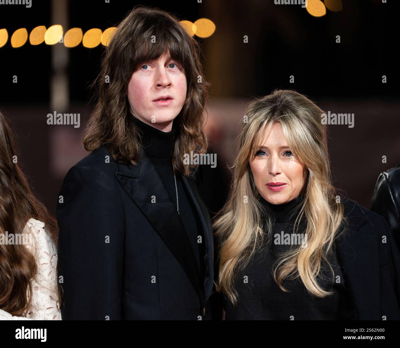 Tom Ogden of Blossoms, left, and Katie Donovan pose for photographers upon arrival at the ...