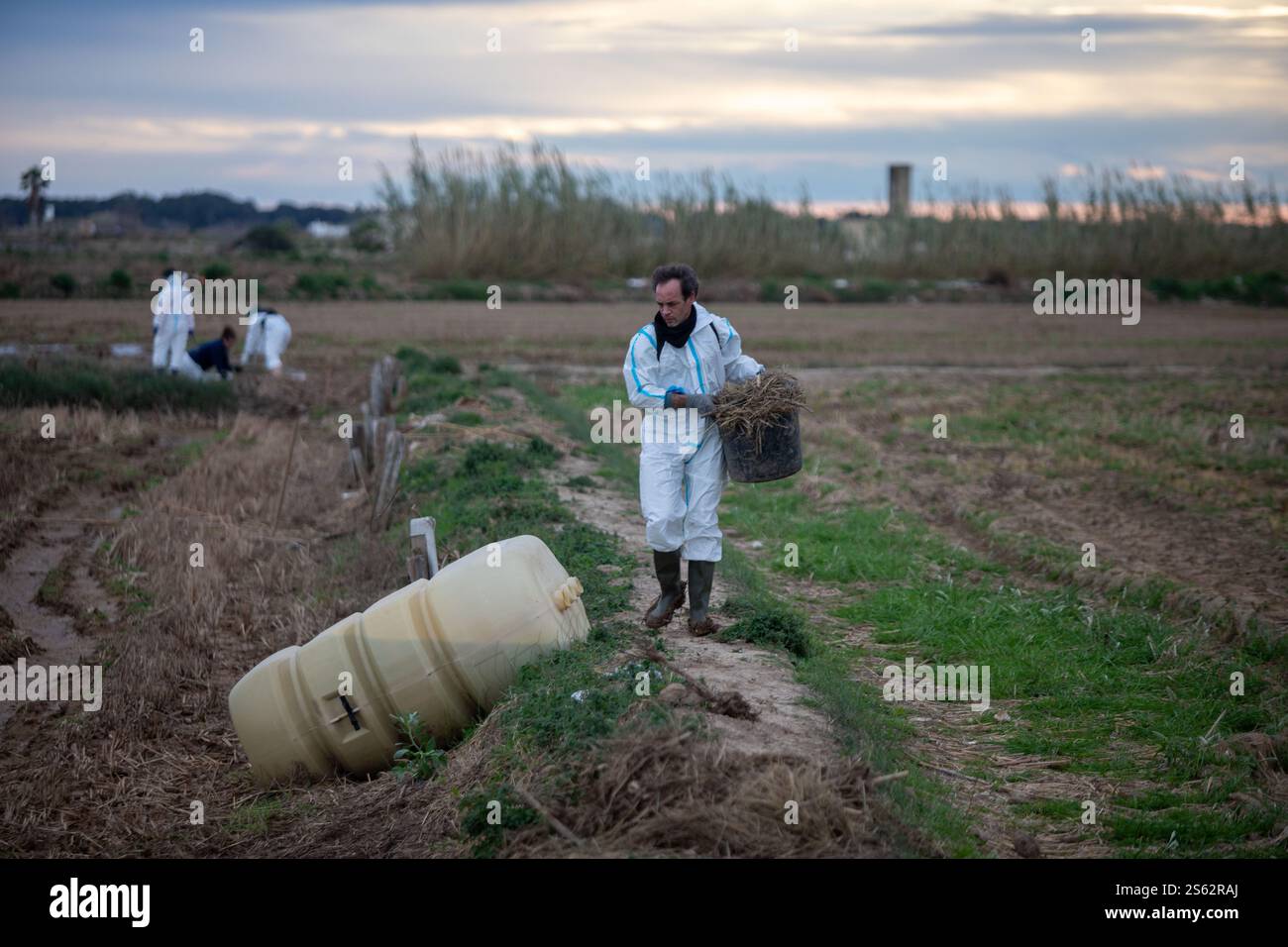 Volunteers clean fields of garbage, pellets, buildings, and chemical ...