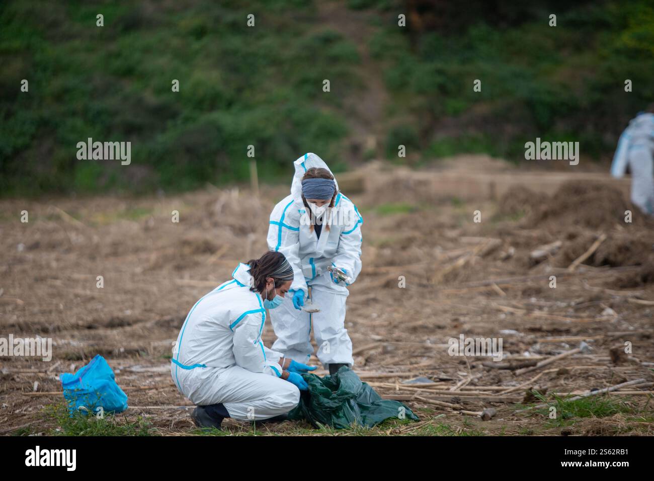 Volunteers clean fields of garbage, pellets, buildings, and chemical ...