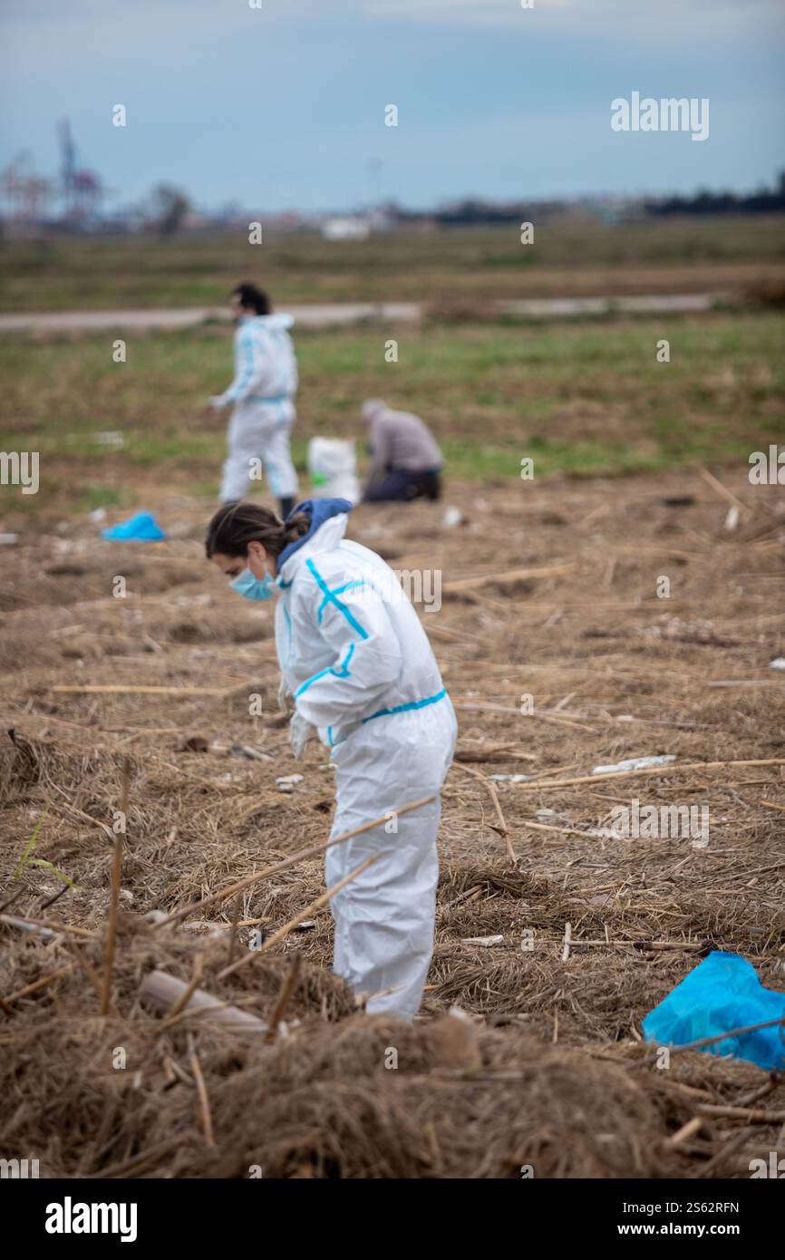 Volunteers clean fields of garbage, pellets, buildings, and chemical ...