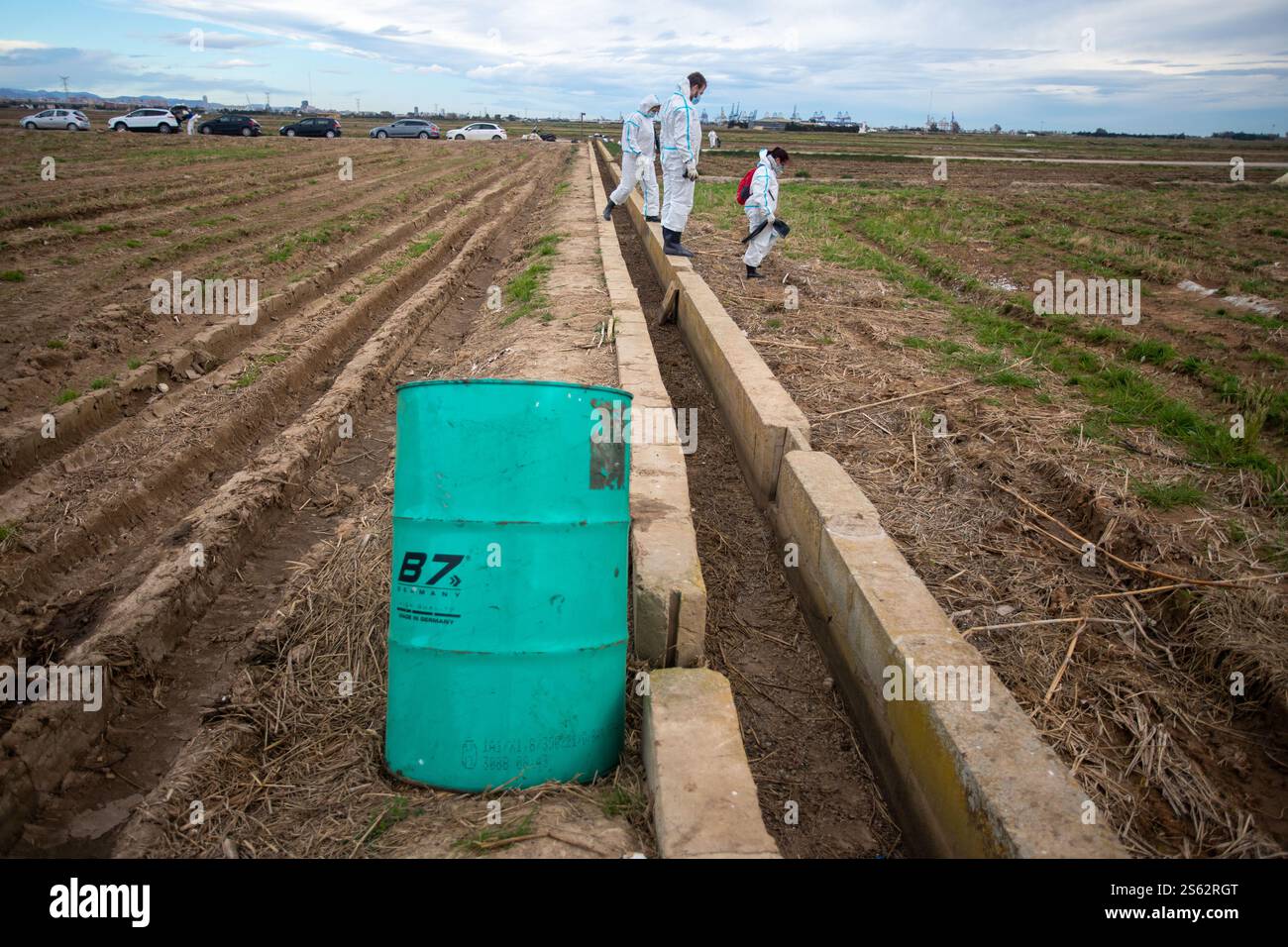 Volunteers clean fields of garbage, pellets, buildings, and chemical ...