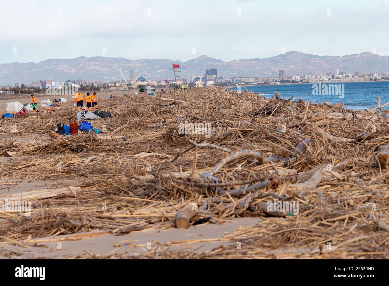 Workers are carrying out cleaning tasks on the beach Stock Photo - Alamy