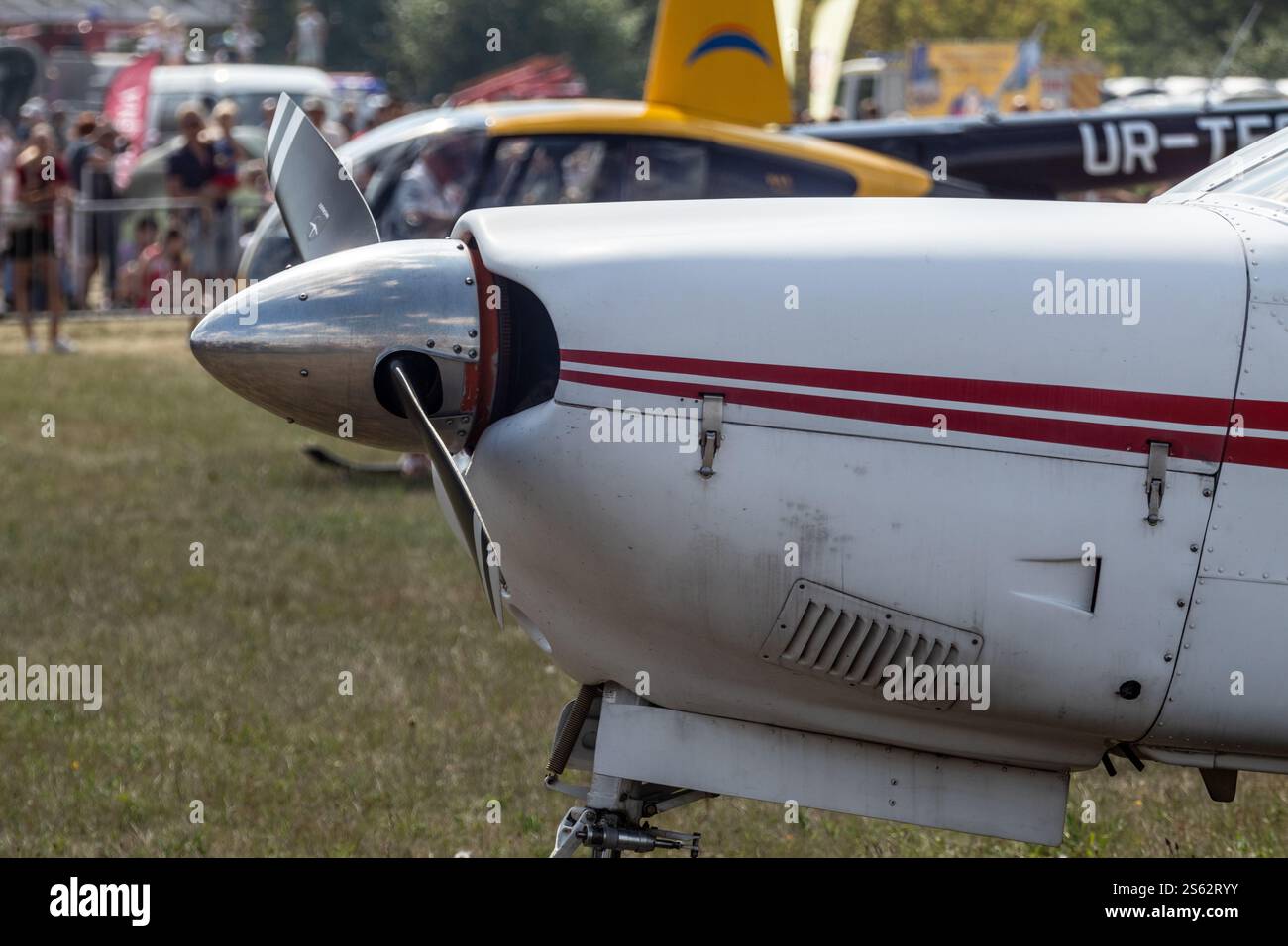 Two-blade propeller of small motor plane close-up on airshow grass ...