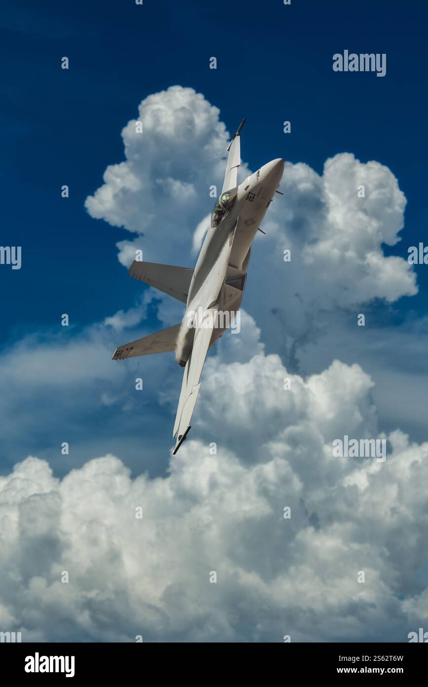American fighter jet flying in a dramatic sky Stock Photo - Alamy