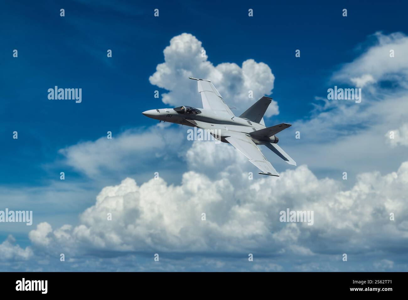 American fighter jet flying in a dramatic sky Stock Photo - Alamy