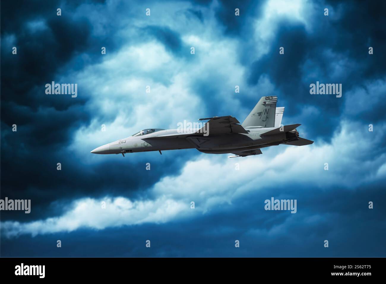American fighter jet flying in a dramatic sky Stock Photo - Alamy