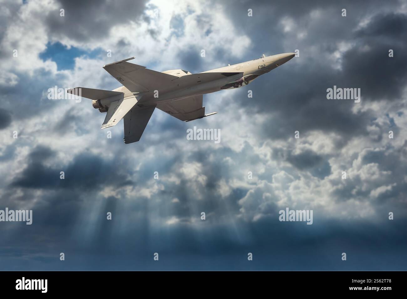 American fighter jet flying in a dramatic sky Stock Photo - Alamy