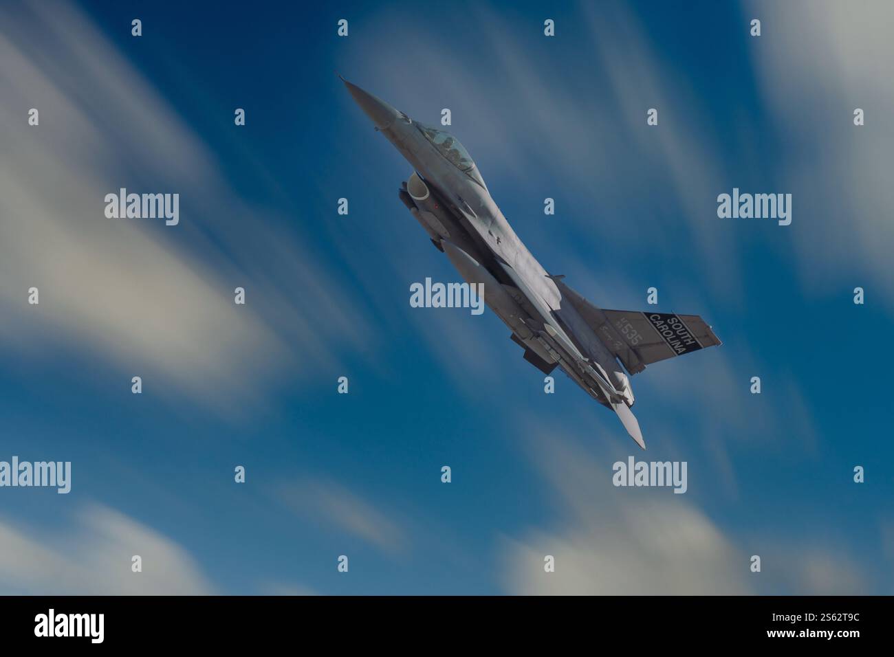American fighter jet flying in a dramatic sky Stock Photo - Alamy