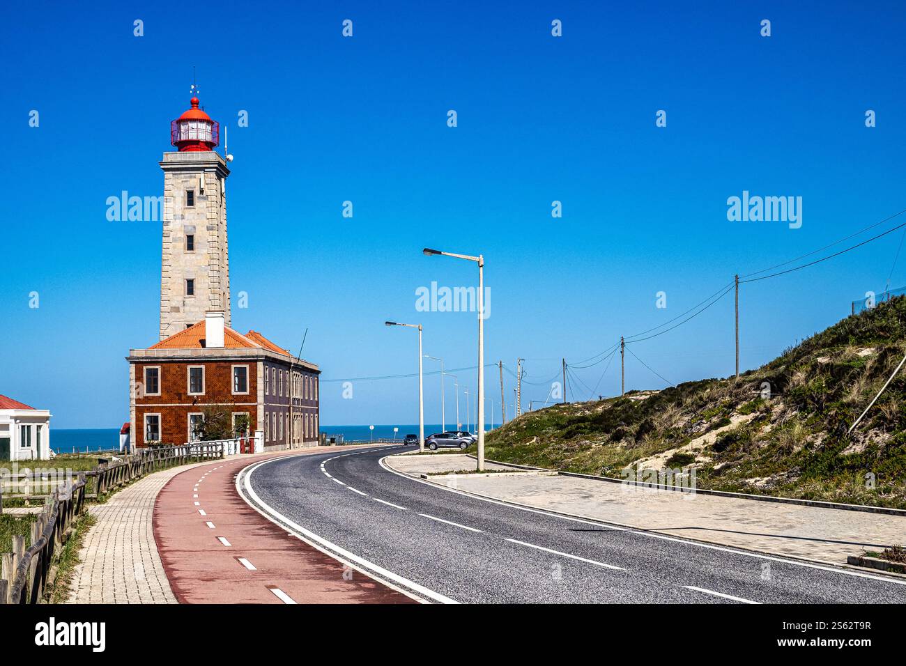 The beautiful Penedo da Saudade Lighthouse at Praia da Concha in Sao ...