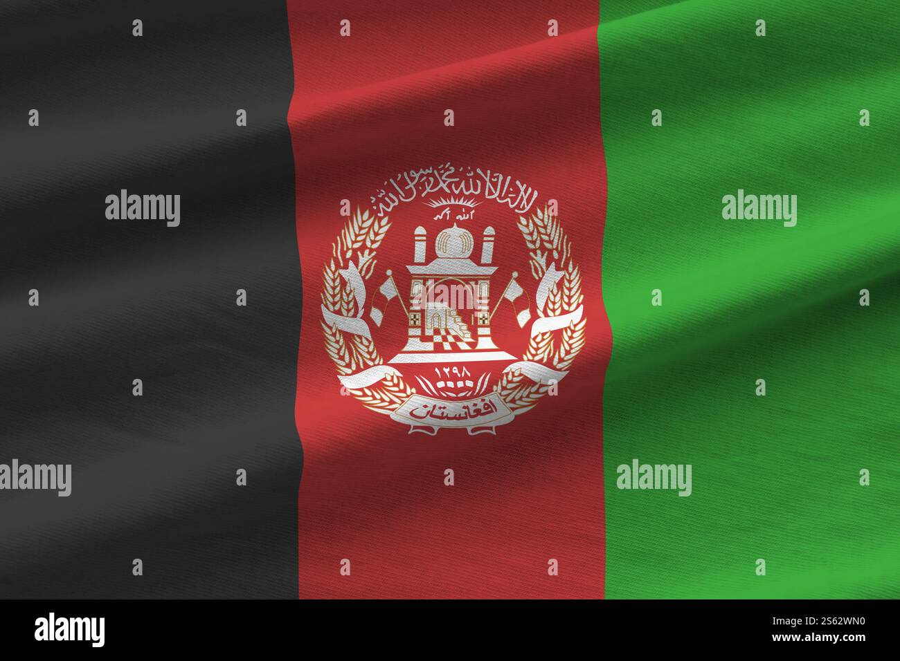 Afghanistan flag with big folds waving close up under the studio light ...