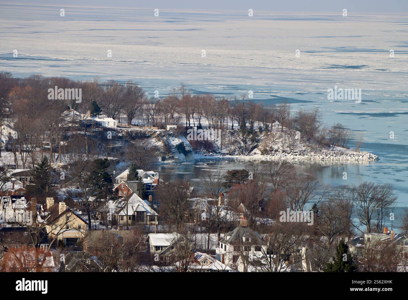 Aerial view of Lakewood Park point and partly ice-covered Lake Erie ...