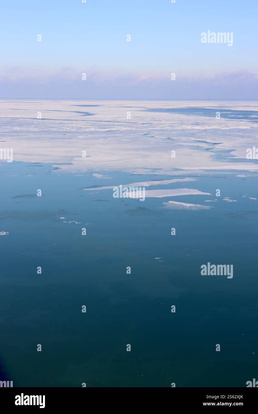 Aerial view of ice floats on Lake Erie north of Lakewood and Cleveland ...