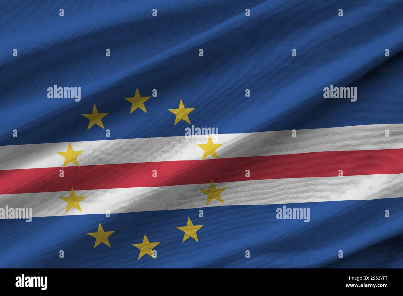 Cabo verde flag with big folds waving close up under the studio light ...