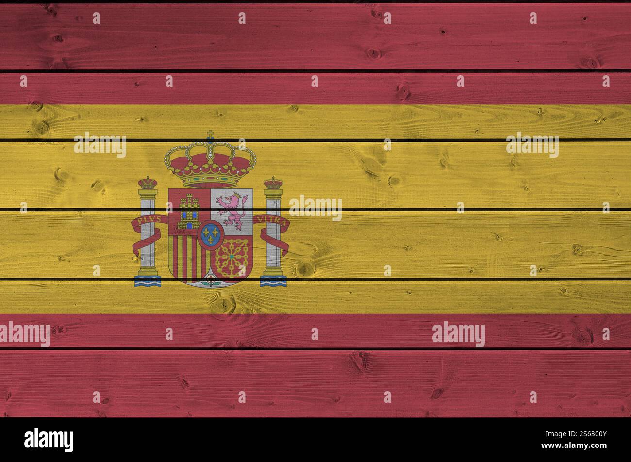 Spain flag depicted in bright paint colors on old wooden wall close up ...