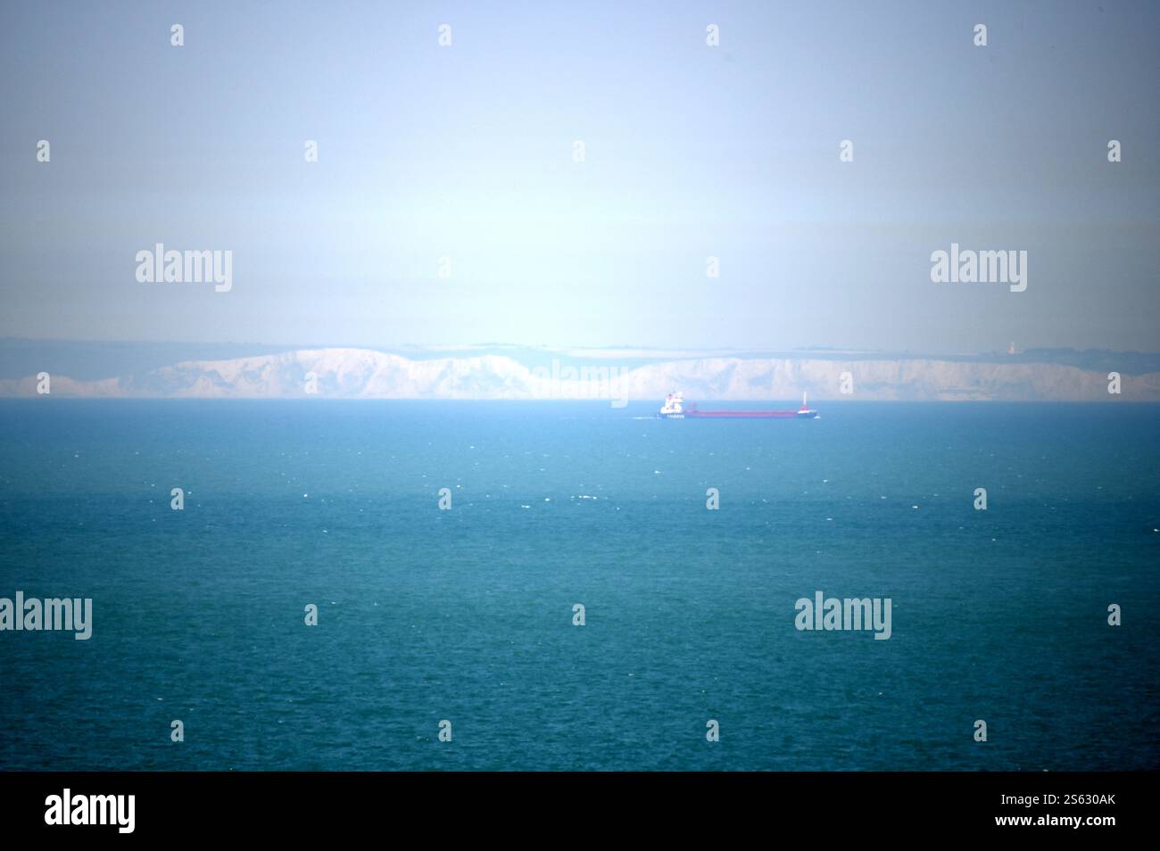 A boat in the distance in this view across the Channel towards England ...