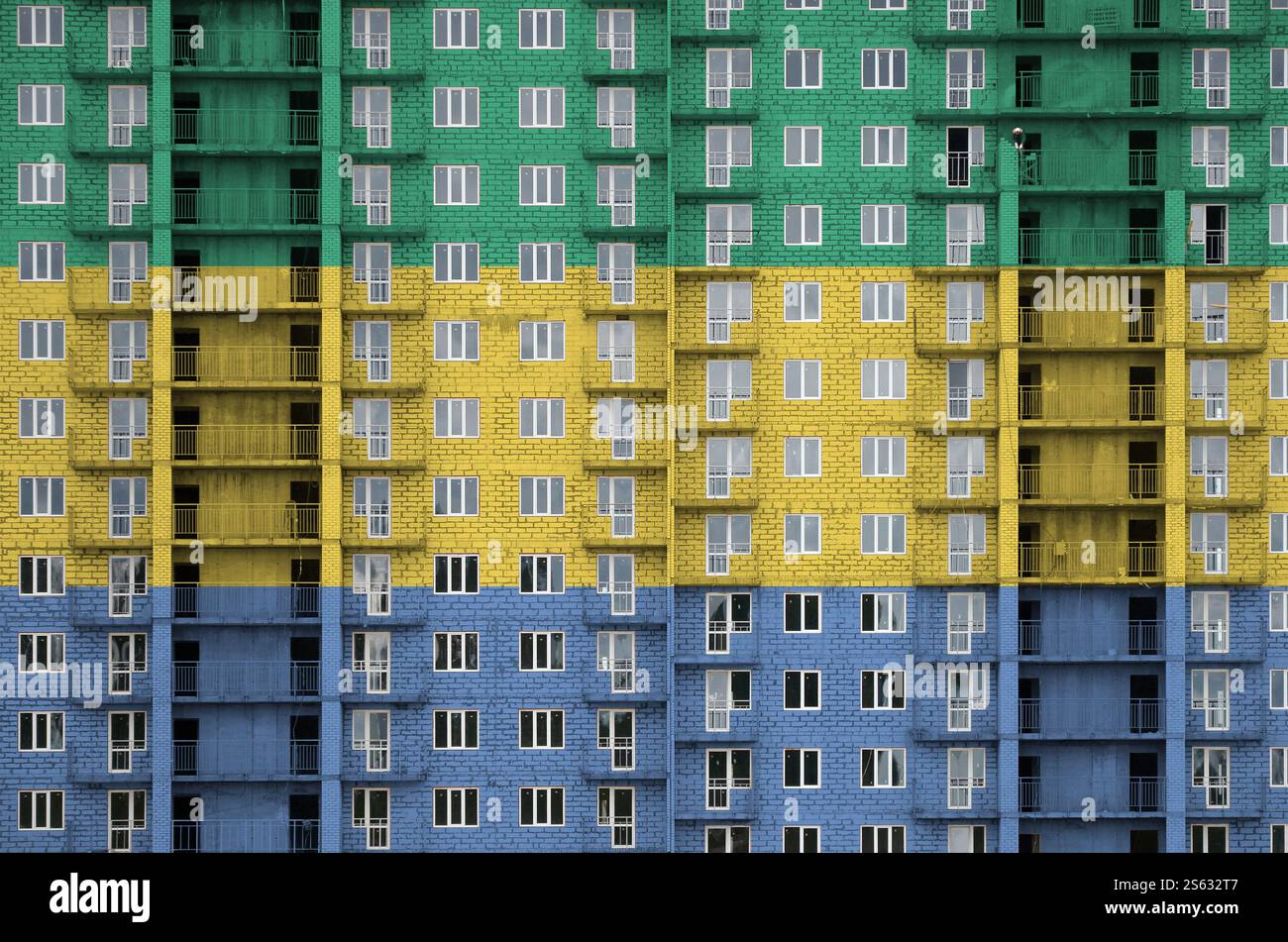 Gabon flag depicted in paint colors on multi-storey residental building ...