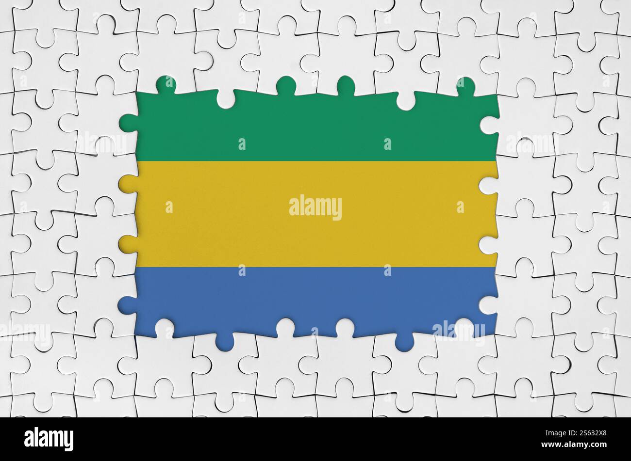 Gabon flag in frame of white puzzle pieces with missing central parts ...