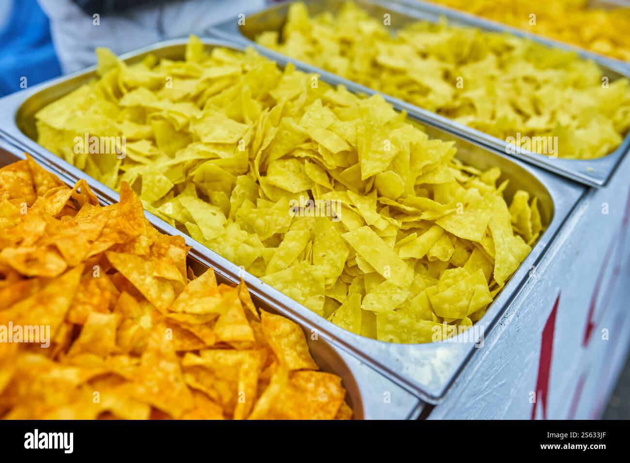 Hand cut triangular potato chips at the county fair Stock Photo - Alamy