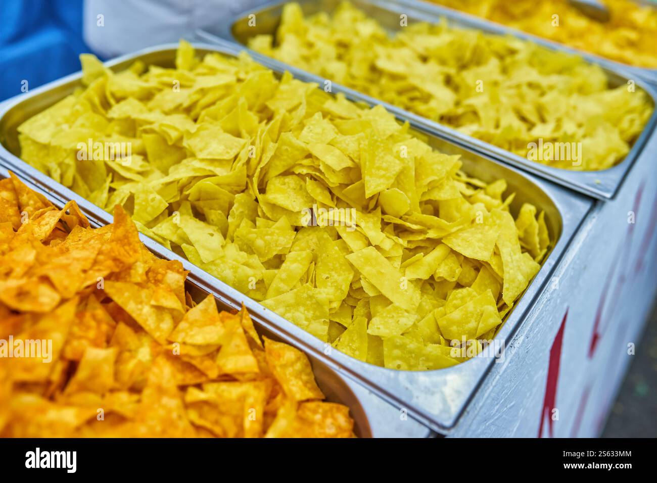 Hand cut triangular potato chips at the county fair Stock Photo - Alamy