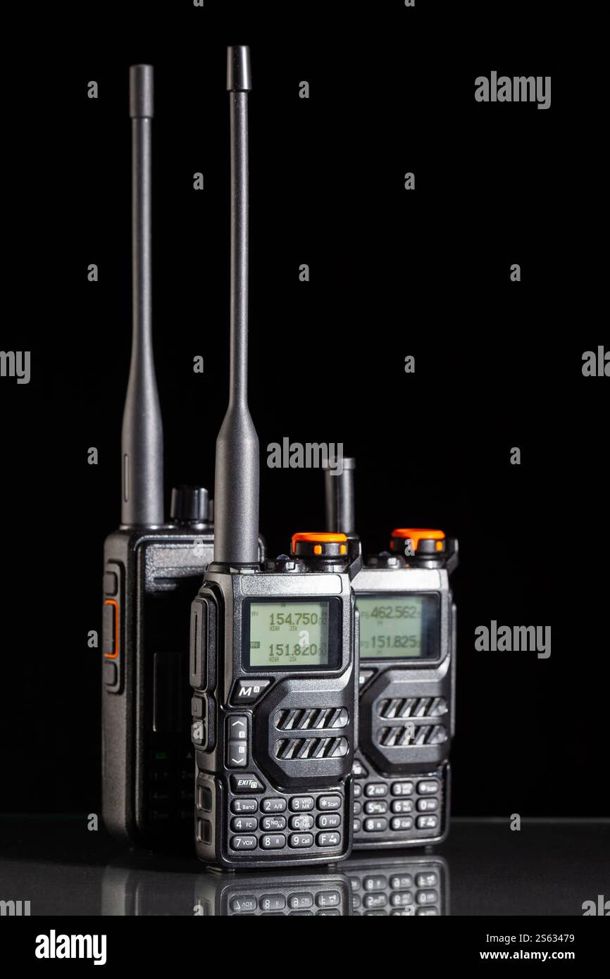 Two-way radios close-up on the black background Stock Photo - Alamy
