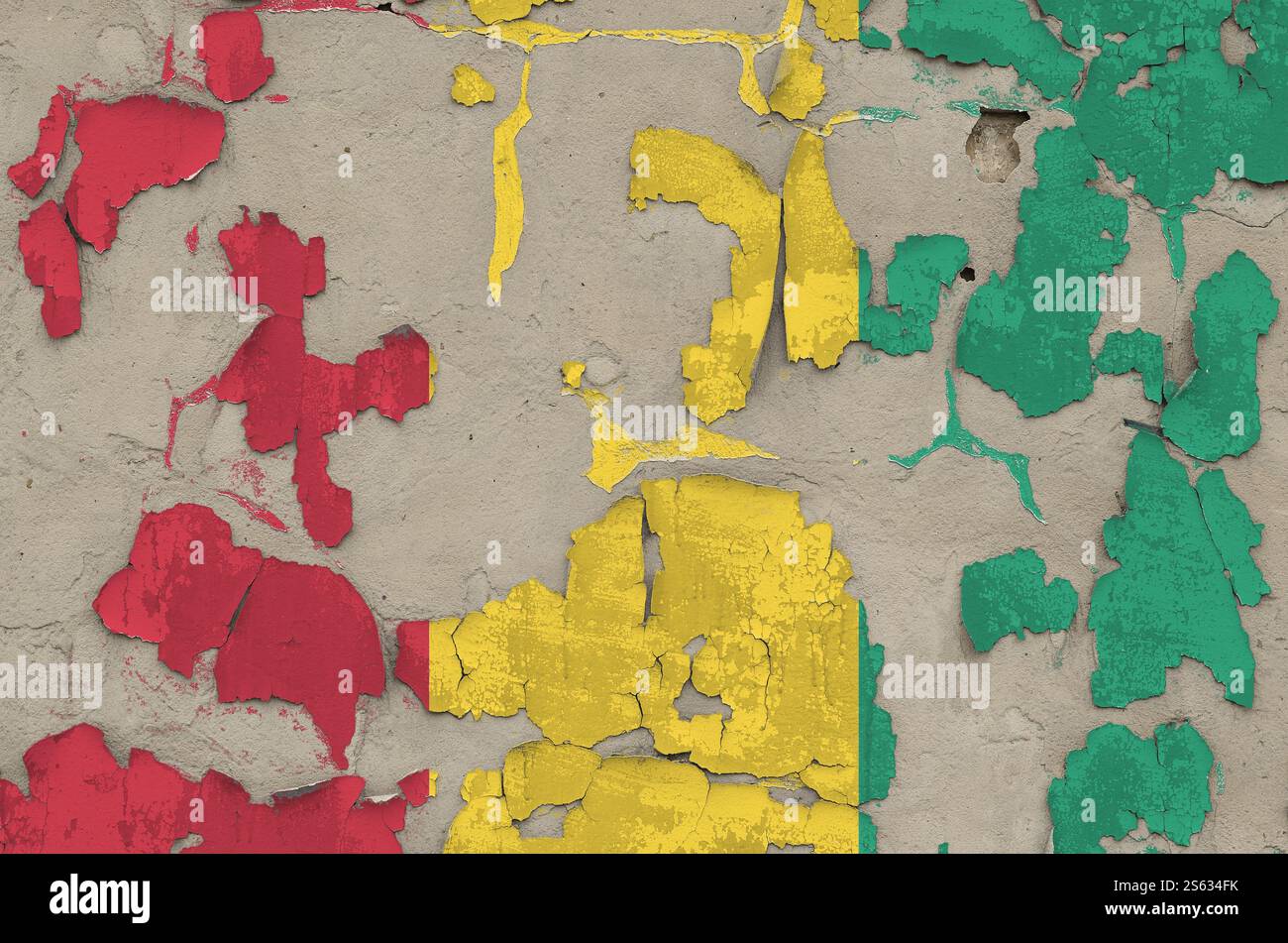 Guinea flag depicted in paint colors on old obsolete messy concrete ...