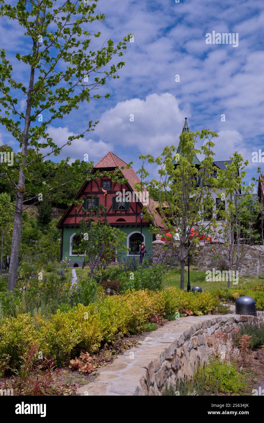 House in a park hi-res stock photography and images - Alamy