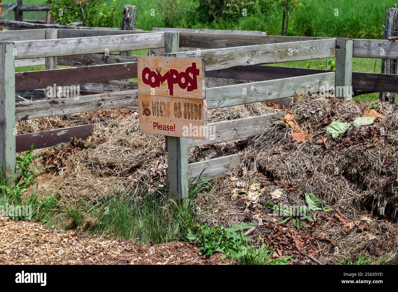 Outdoor 3 bin compost system in a garden Stock Photo - Alamy