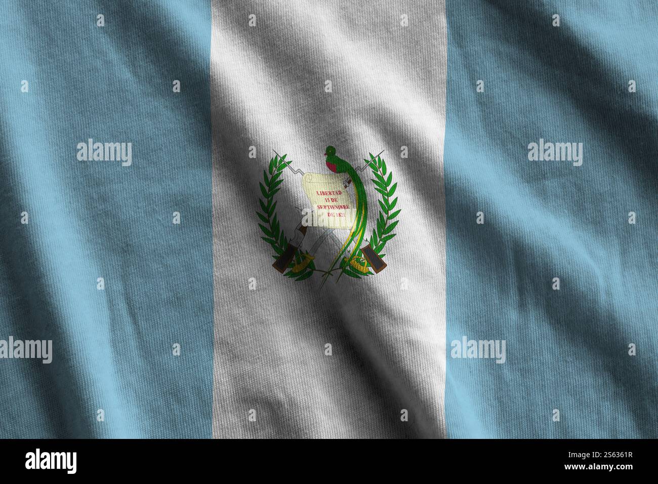 Guatemala flag with big folds waving close up under the studio light ...