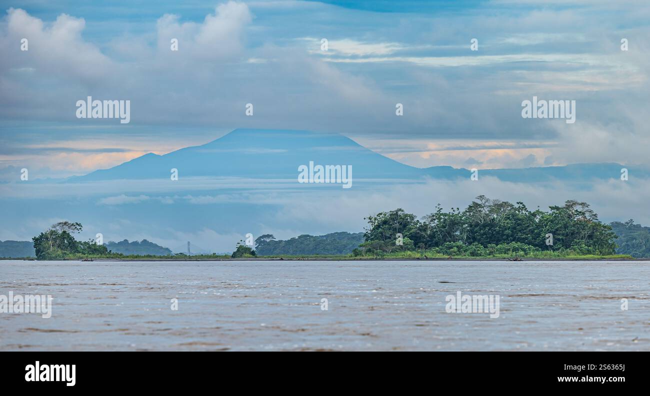 View of Sumaco volcano peak hidden by clouds from Napo River near El ...
