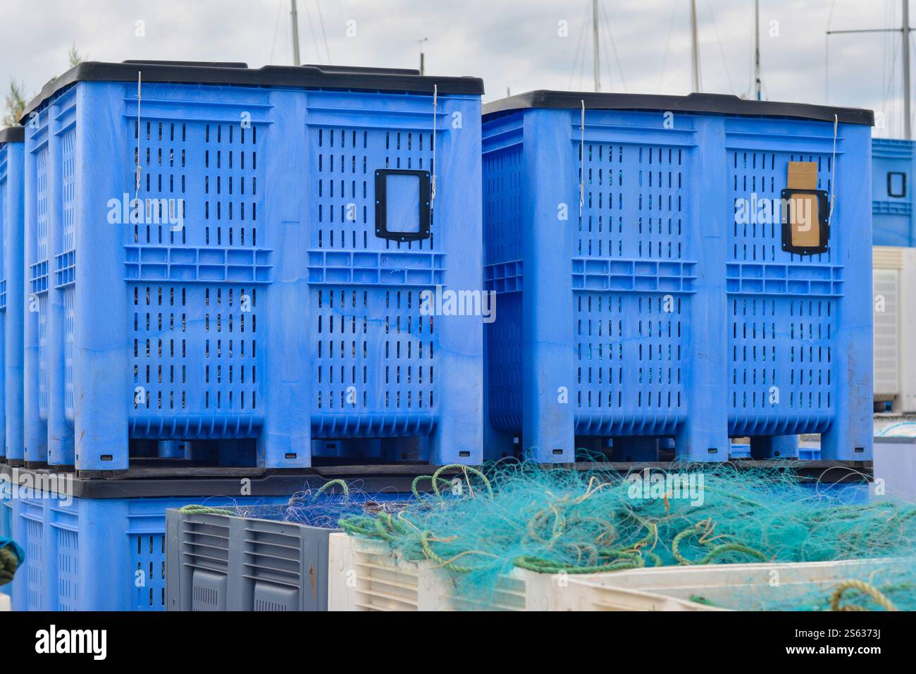 Plastic containers of fishing nets Stock Photo - Alamy