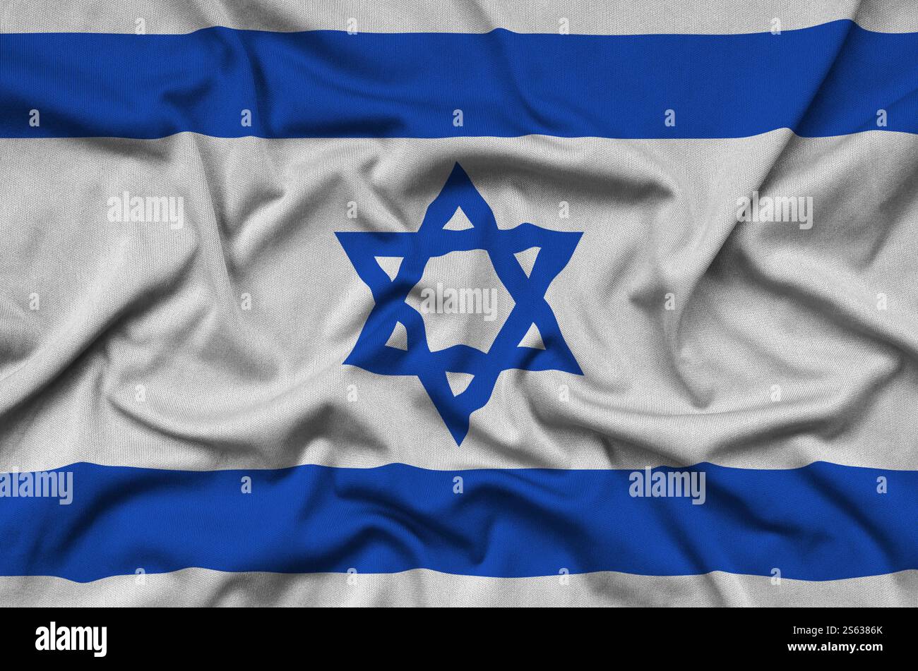 Israel flag is depicted on a sports cloth fabric with many folds. Sport ...