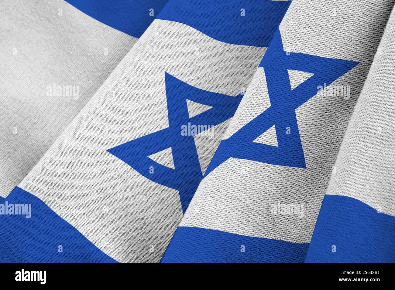Israel flag with big folds waving close up under the studio light ...