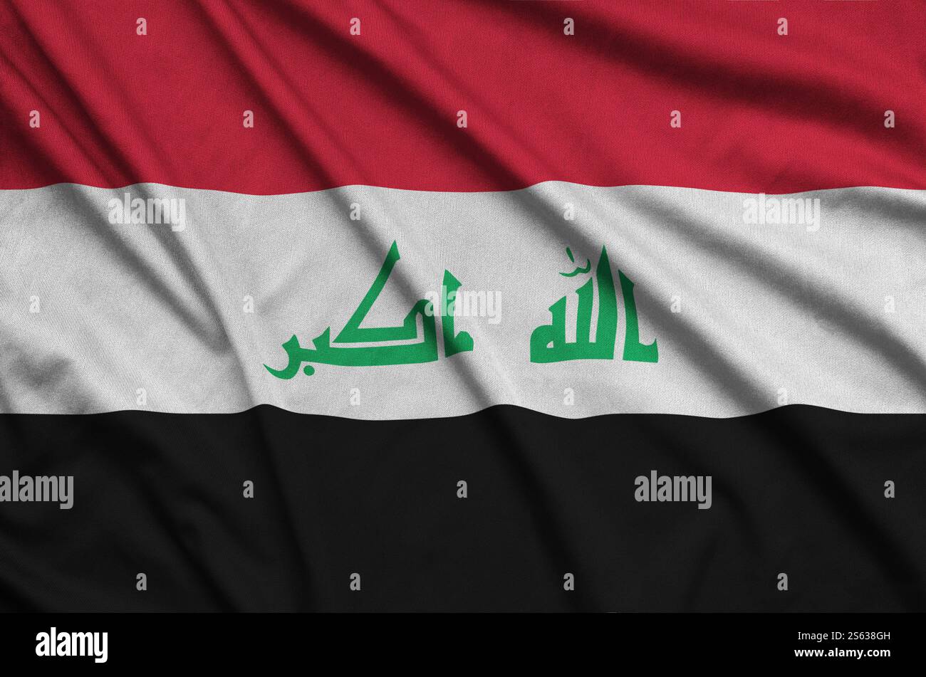 Iraq flag is depicted on a sports cloth fabric with many folds. Sport ...