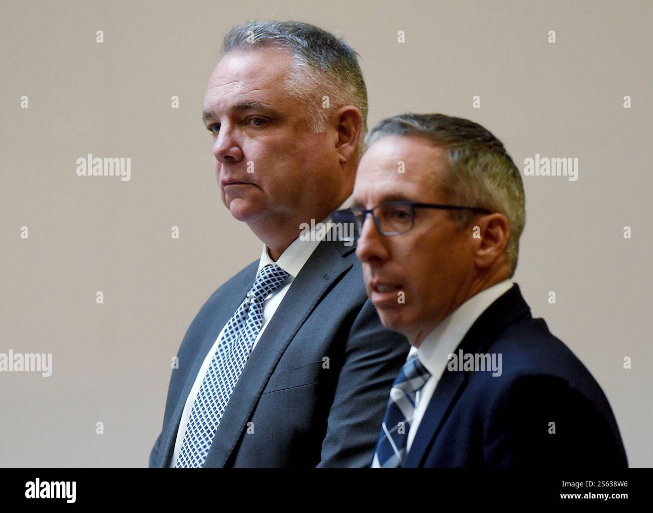 Stephen Murphy, left, stands with his defense attorney Charles Keefe as ...