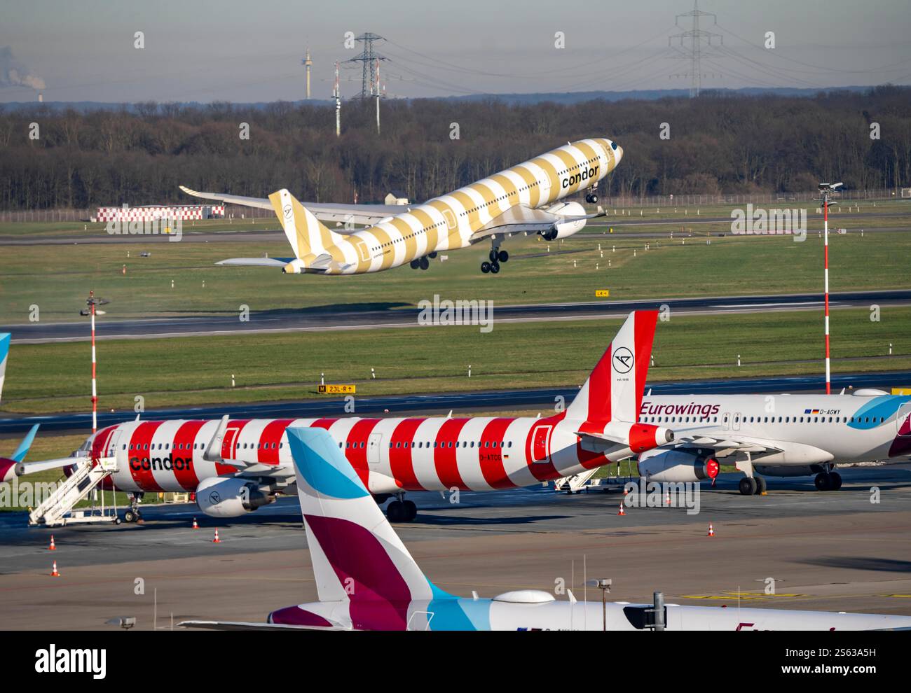 Condor Airbus A330 taking off, various aircraft in parking position at ...