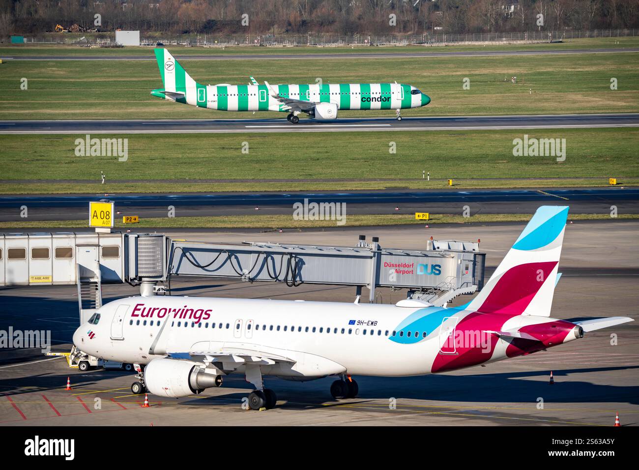 Condor Airbus A321 taking off, Eurowings Airbus A32 at the terminal, at ...