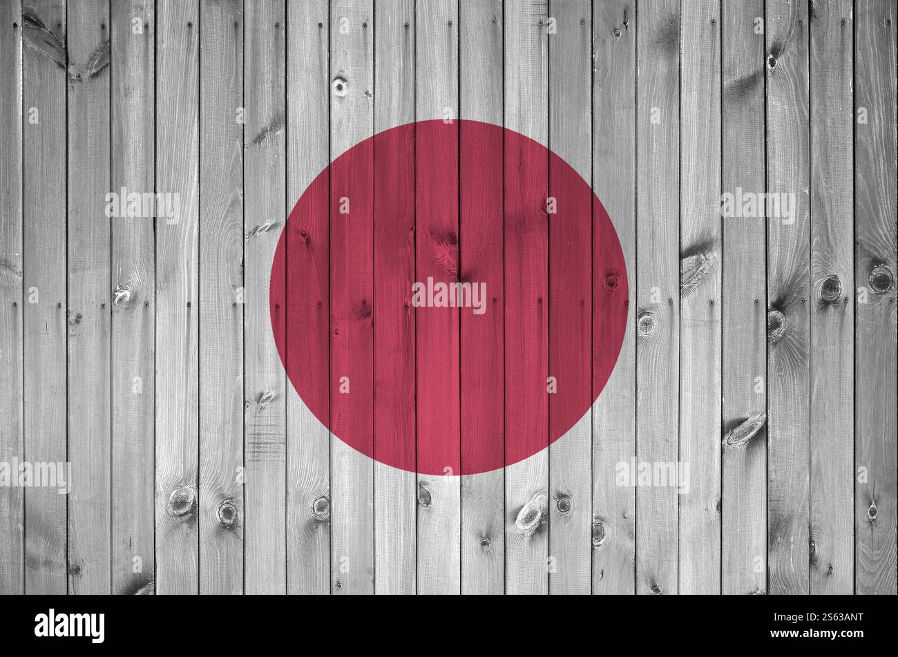 Japan flag depicted in bright paint colors on old wooden wall close up ...