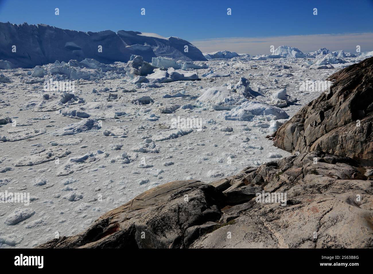 Huge icebergs floating through the Ilulissat Icefjord a UNESCO World ...