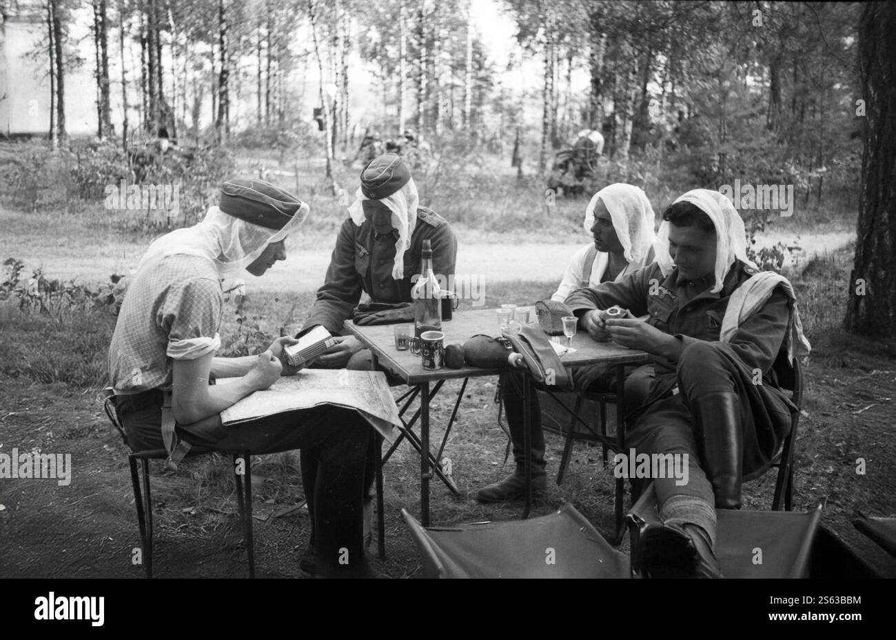 German soldiers wearing Mosquito protection nets on their heads in ...