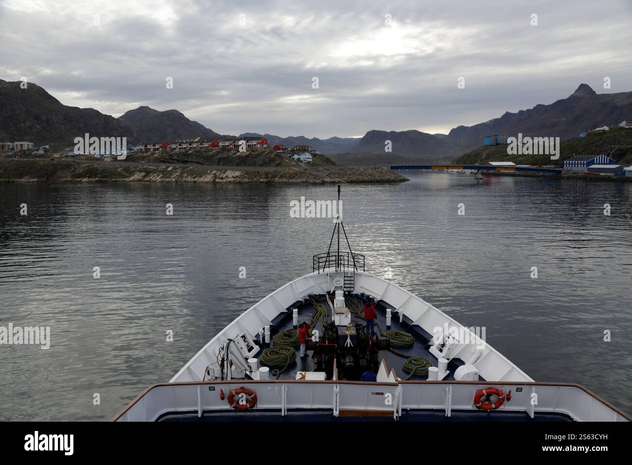 A cruise ship enter the harbor of Sisimiut, the second largest city in ...