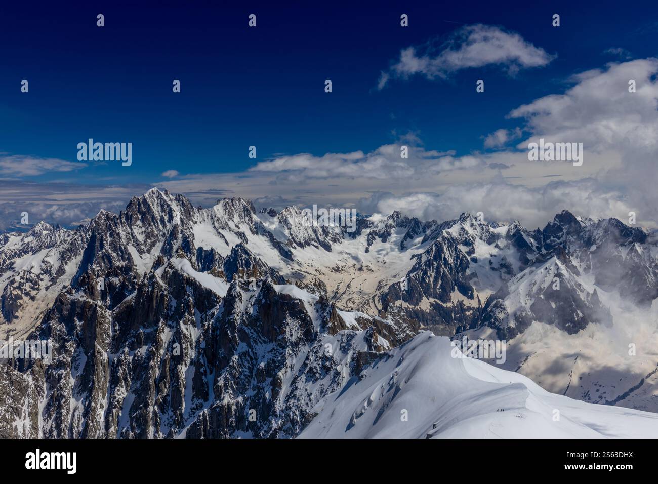 Snow mountain summits and white ice glacier in the Alps. Mont Blanc ...