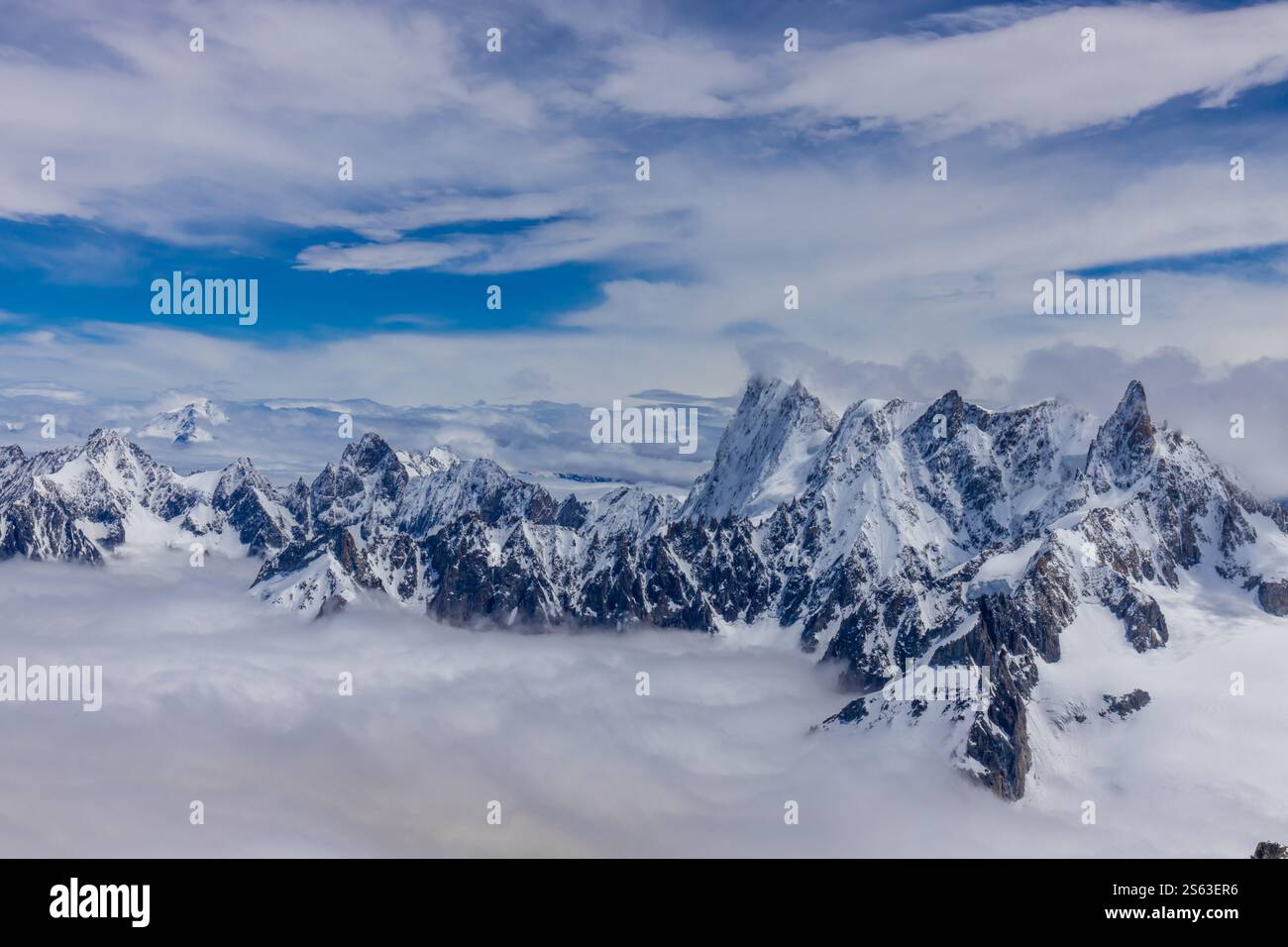 Snow mountain summits and white ice glacier in the Alps. Mont Blanc ...
