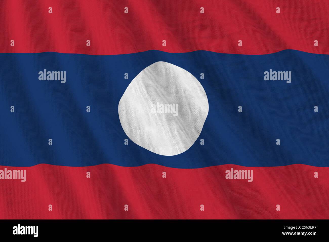Laos flag with big folds waving close up under the studio light indoors ...