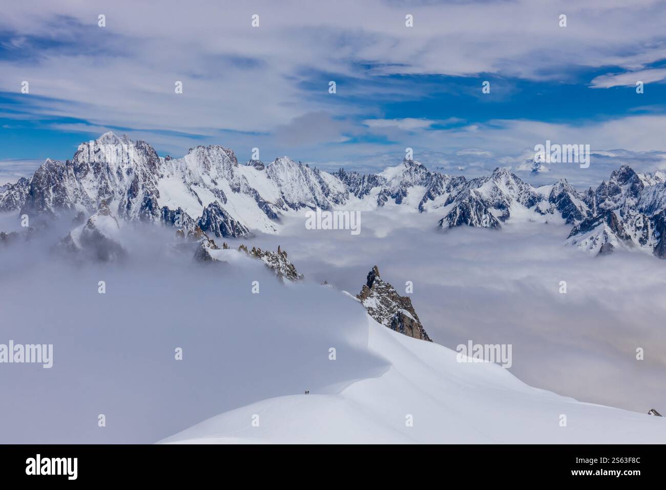 Snow mountain summits and white ice glacier in the Alps. Mont Blanc climbing route and views ...