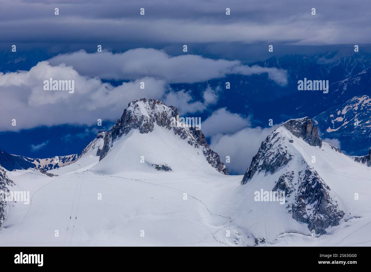 Snow mountain summits and white ice glacier in the Alps. Mont Blanc ...