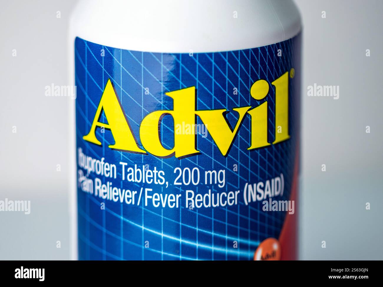 Bottle of Advil Ibuprofen Tablets close up on white background Stock ...