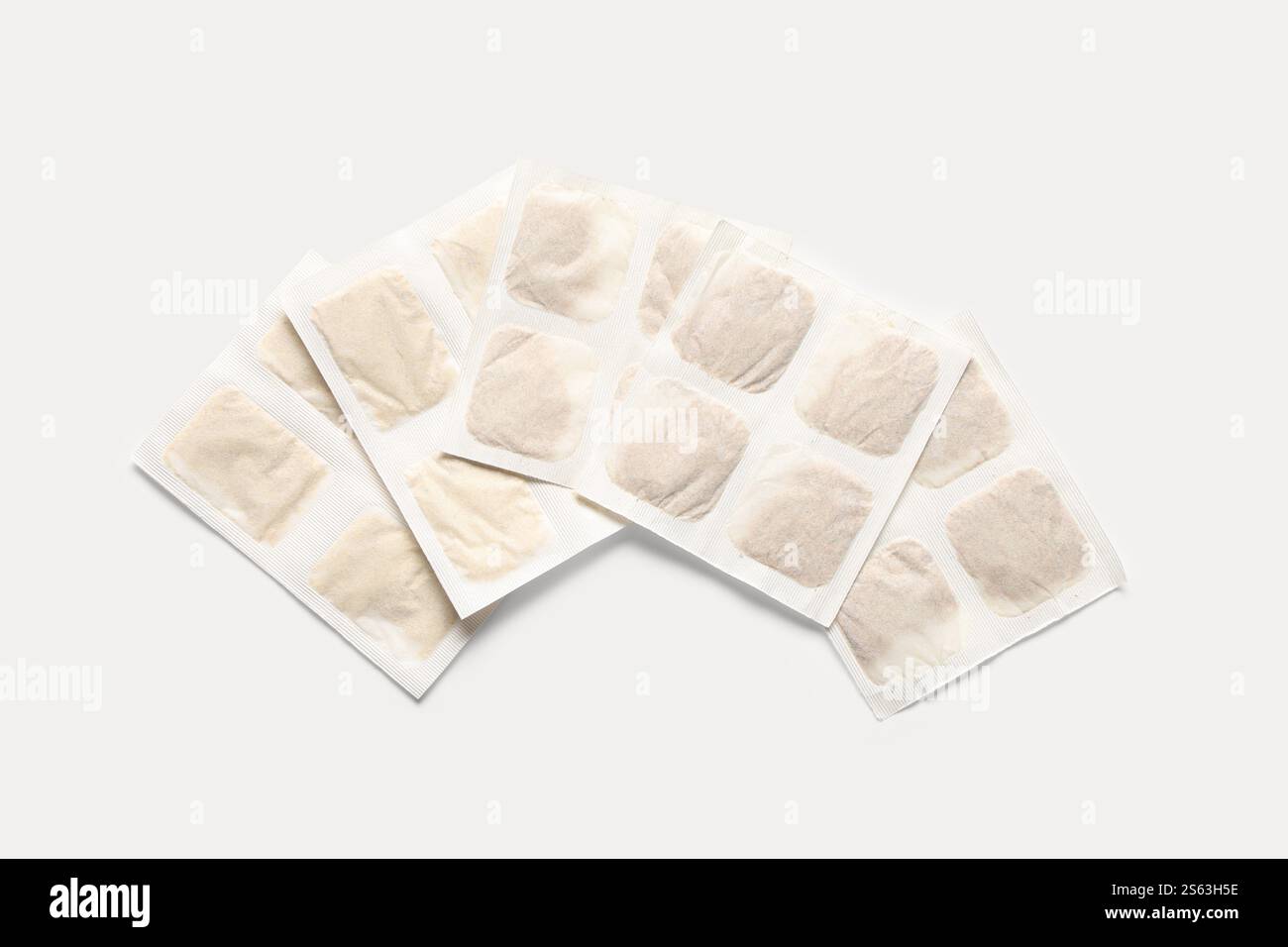 Mustard plasters on white background Stock Photo - Alamy