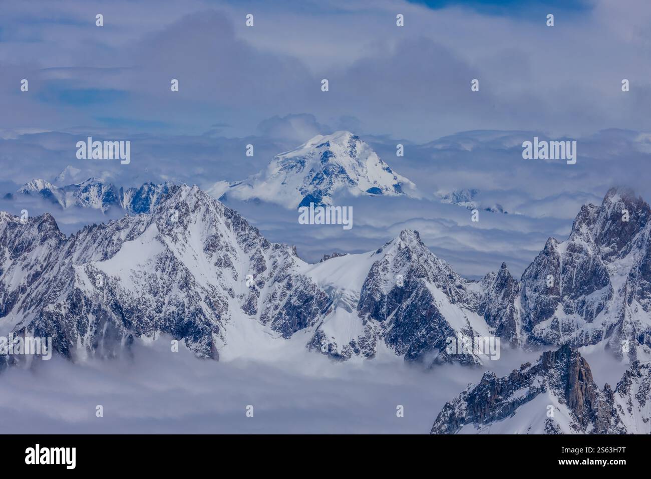 Snow mountain summits and white ice glacier in the Alps. Mont Blanc ...